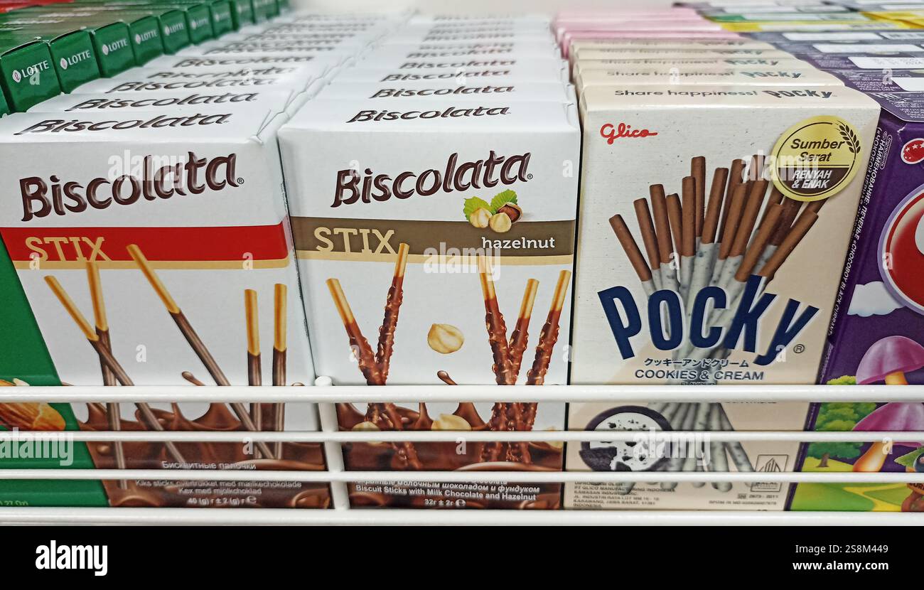 Variety of chocolate stick snacks in grocery store display Stock Photo ...