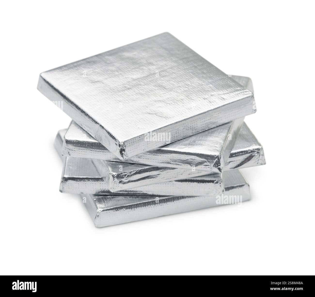 Stack of silver foil wrapped square chocolate bars isolated on white ...