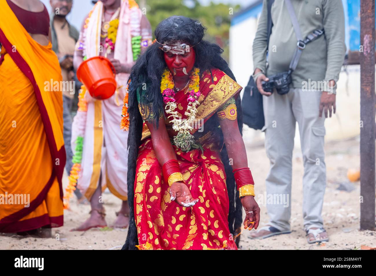 Kulasai, Portrait of indian hindu devotee with painted face and dressed ...