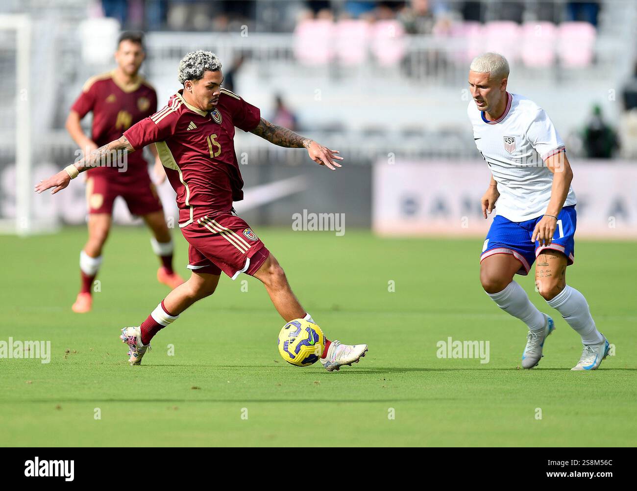 Venezuela midfielder Daniel Pereira (15) dribbles the ball towards ...