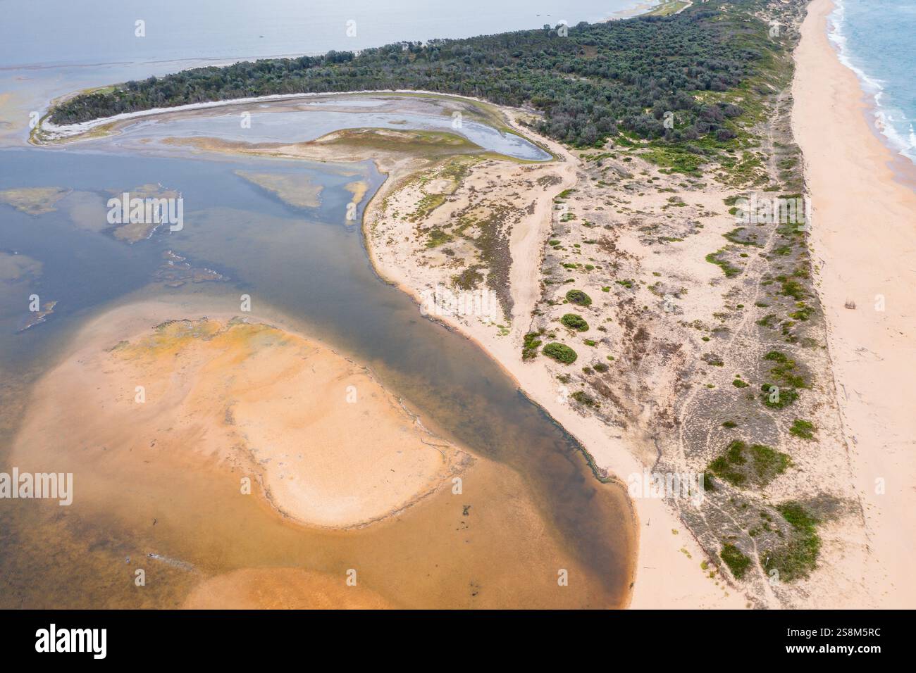 Aerial view of sand bar patterns and wetlands at Coila Creek, Tuross ...