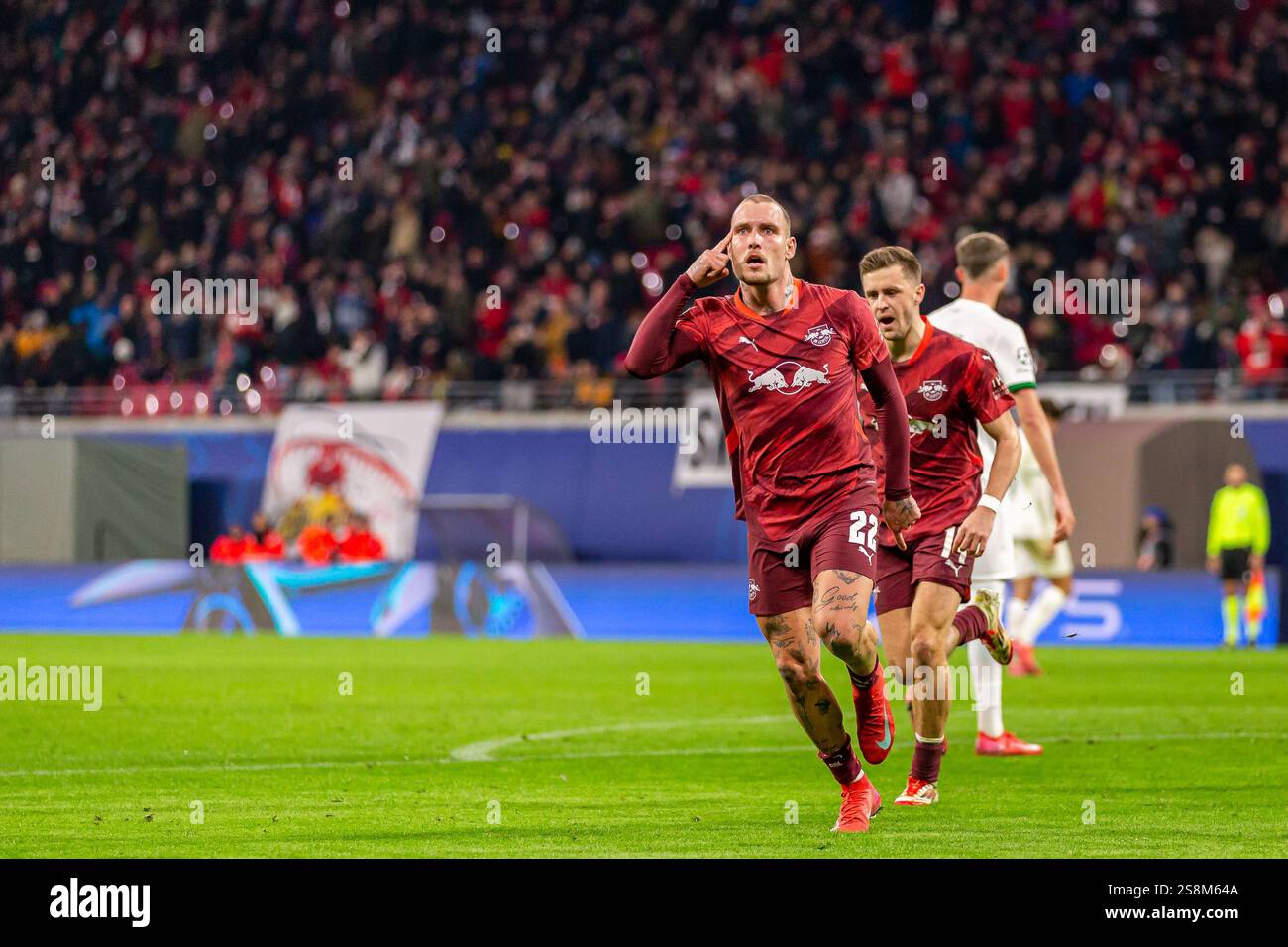 Leipzig, Germany. 22nd Jan, 2025. David Raum (22) of RB Leipzig scores ...