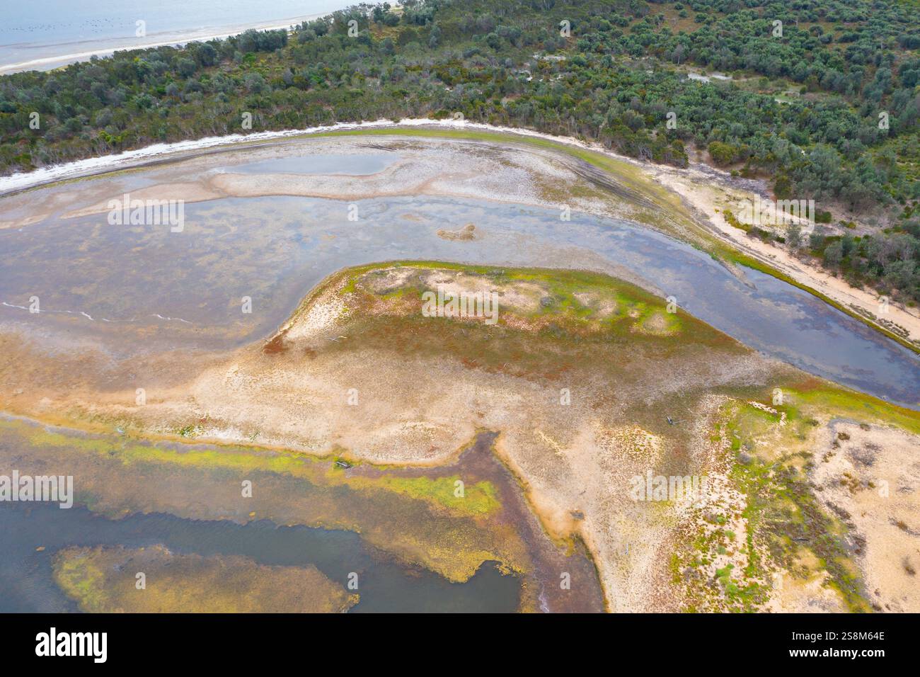 Aerial view of sand bar patterns and wetlands at Coila Creek, Tuross ...