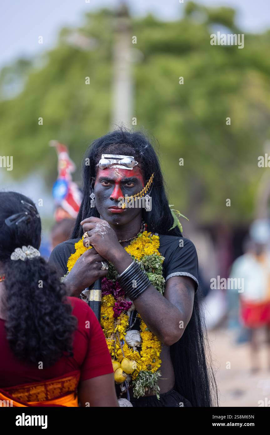 Kulasai, Portrait of indian hindu devotee with painted face and dressed ...