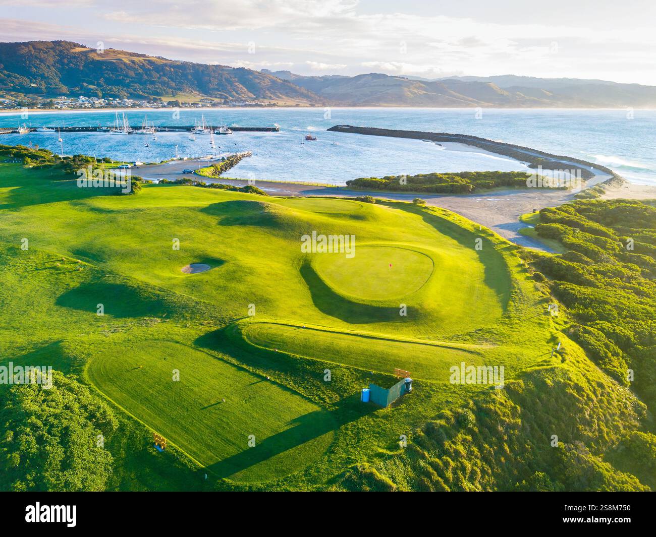 Aerial view over a coastal golf course at Apollo Bay on the Great Ocean ...