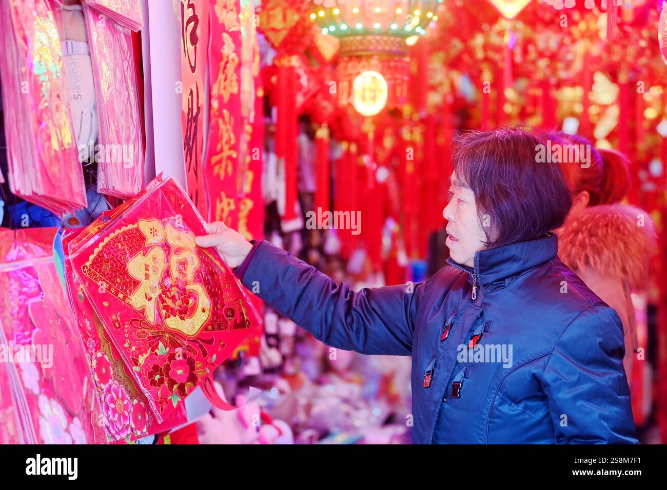 People select Spring Festival decorations in Chongqing, China, 20 ...