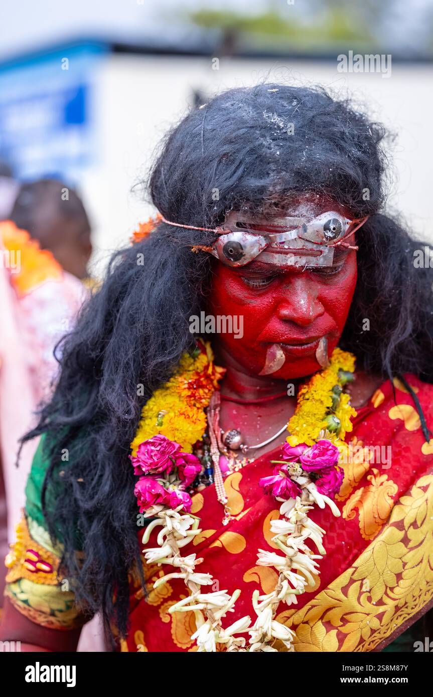 Kulasai, Portrait of indian hindu devotee with painted face and dressed ...