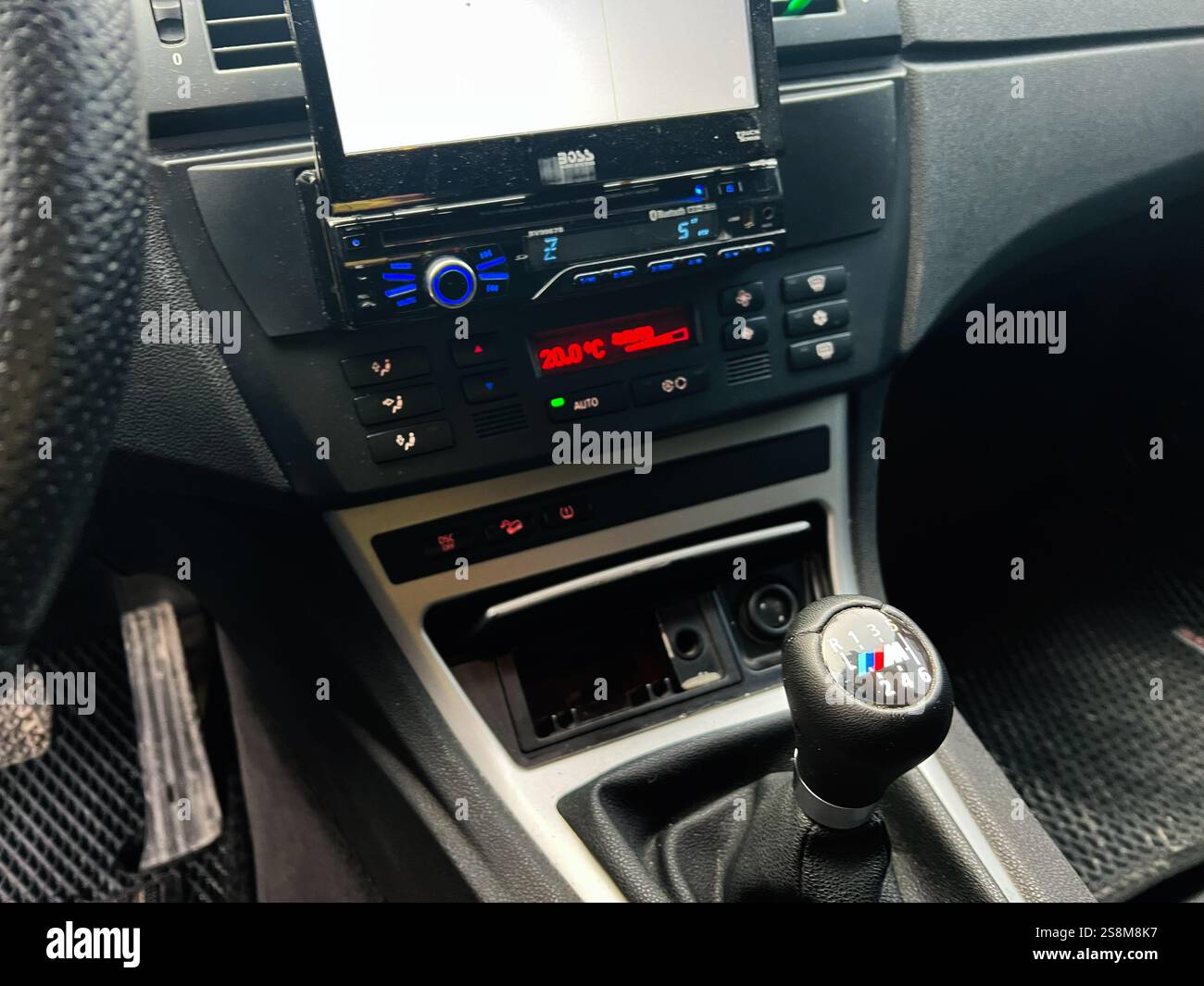 Kyiv, Ukraine - January 22, 2025: Interior view of BMW X3 car featuring the gear shift lever ...