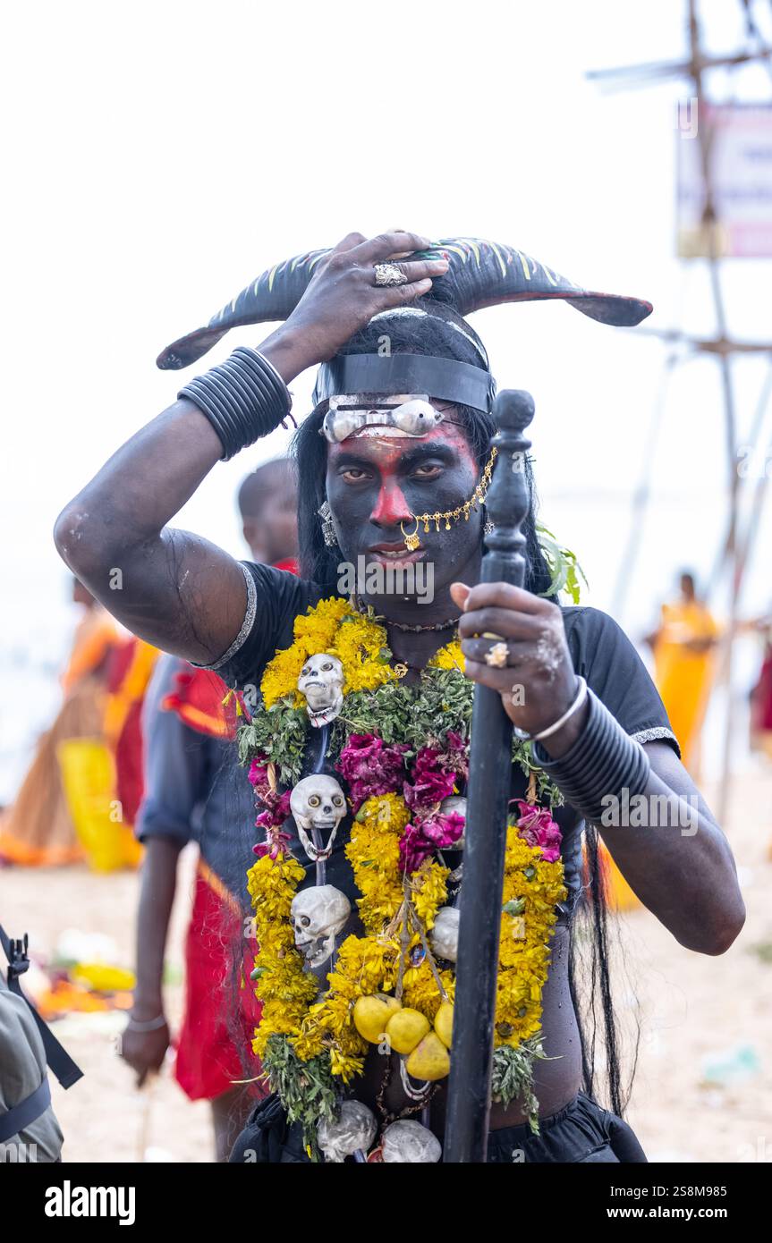 Kulasai, Portrait of indian hindu devotee with painted face and dressed ...
