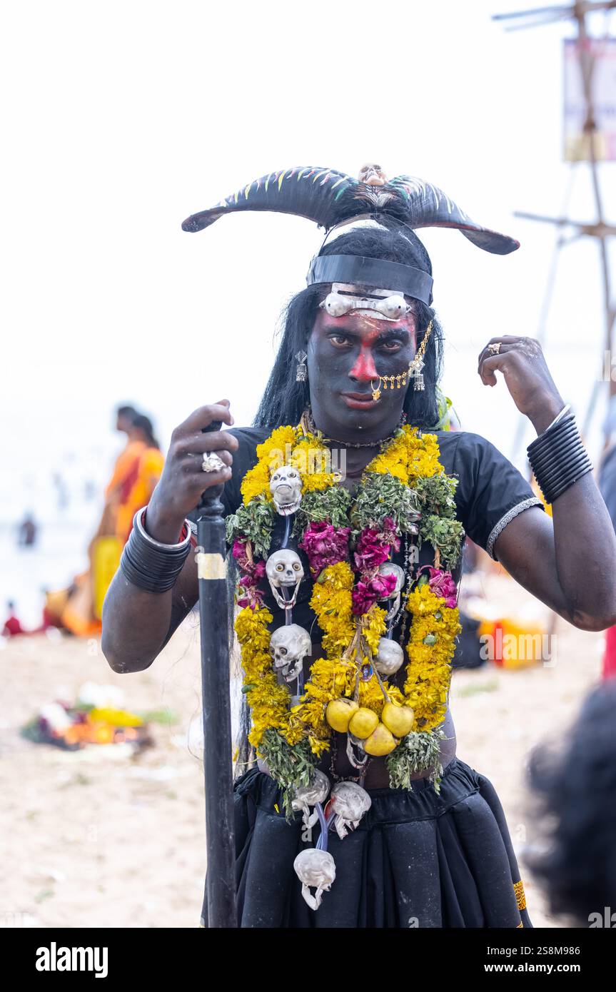 Kulasai, Portrait of indian hindu devotee with painted face and dressed ...