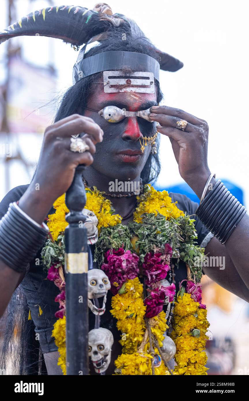 Kulasai, Portrait of indian hindu devotee with painted face and dressed ...