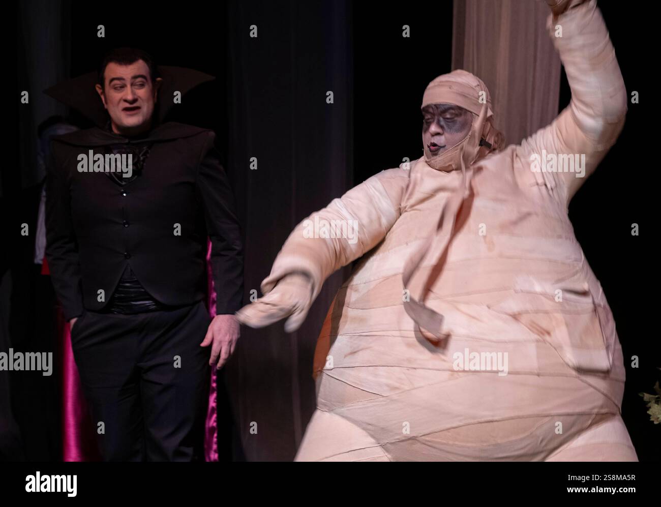 Iranian actors made up as the Mummy and Dracula perform in a scene from ...