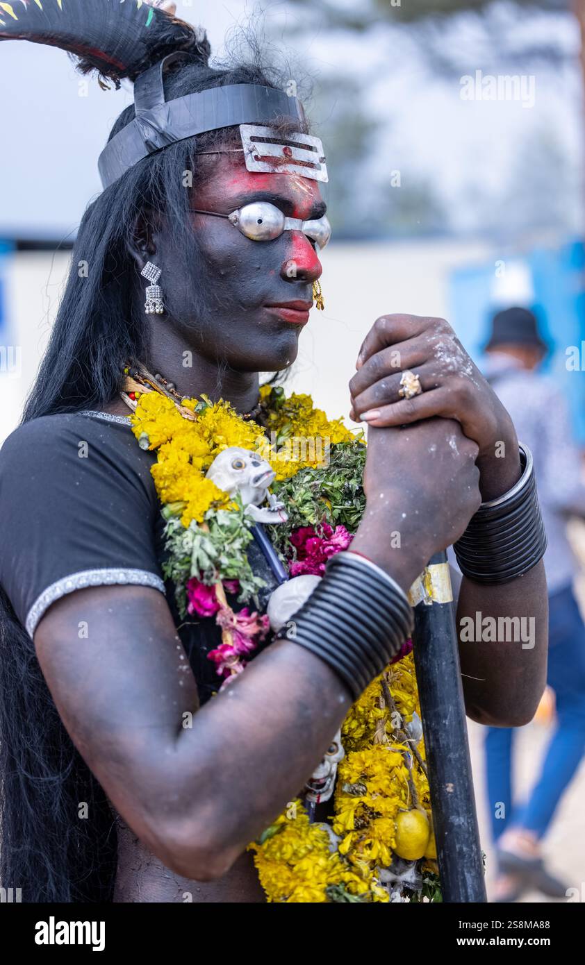 Kulasai, Portrait of indian hindu devotee with painted face and dressed ...