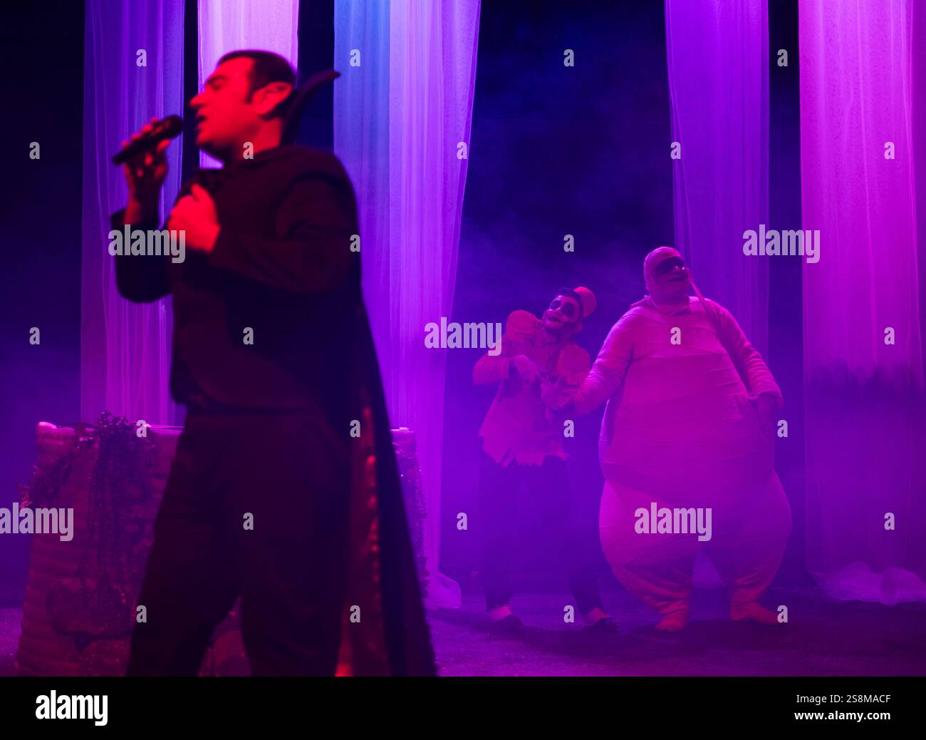 Iranian actors made up as the Mummy (right), Dracula (left), and the ...