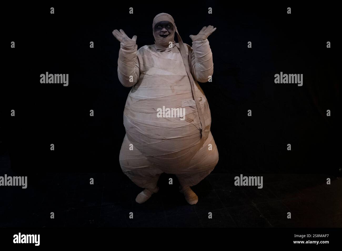 An Iranian actor, made up as the Mummy, poses for a photograph while ...