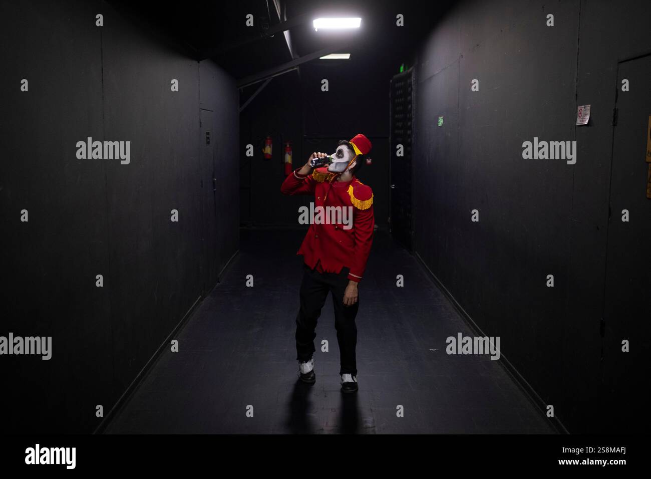 An Iranian actor, made up as a zombie, poses for a photograph while ...