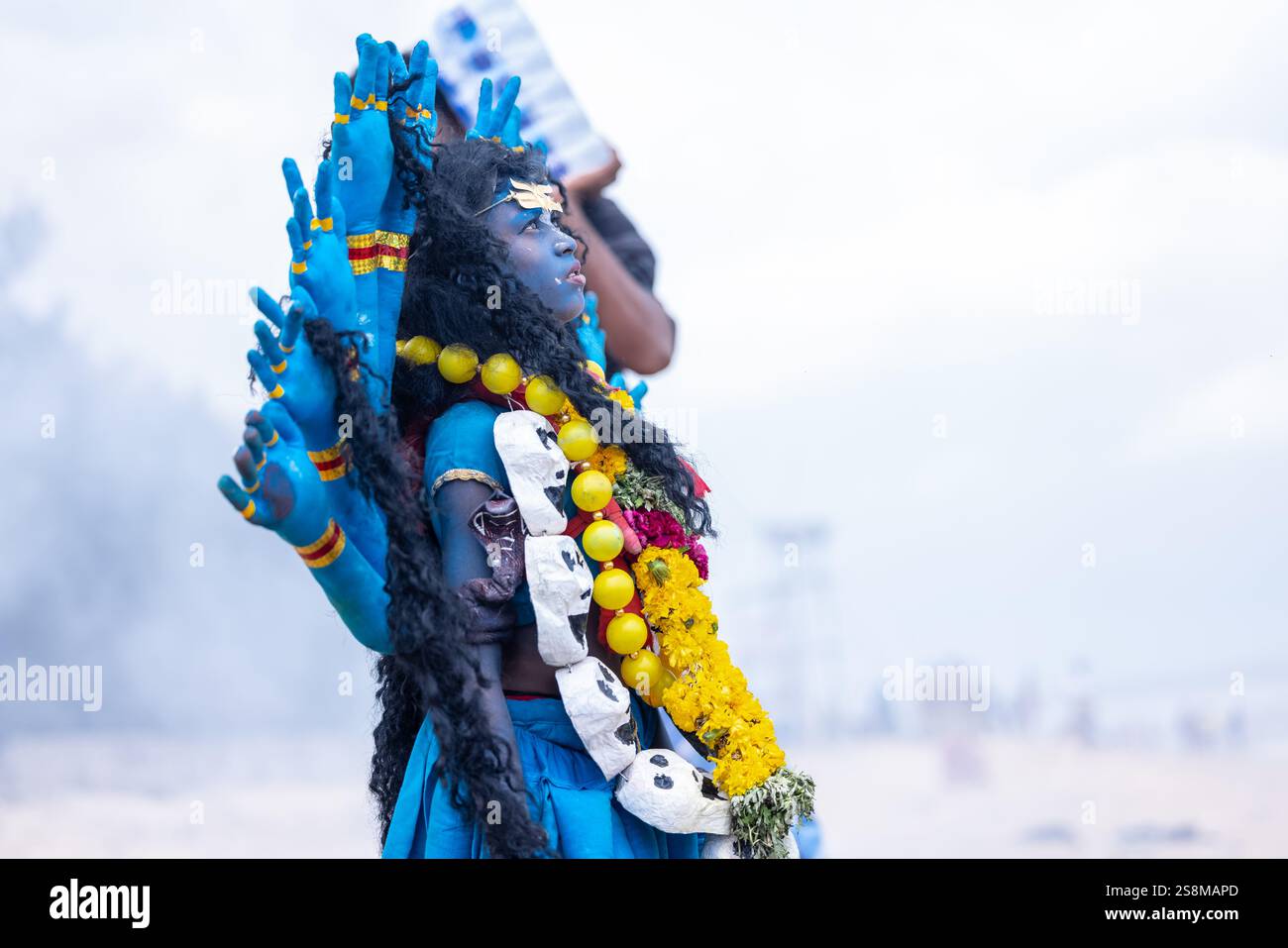 Kulasai, Portrait of indian hindu devotee with painted face and dressed ...