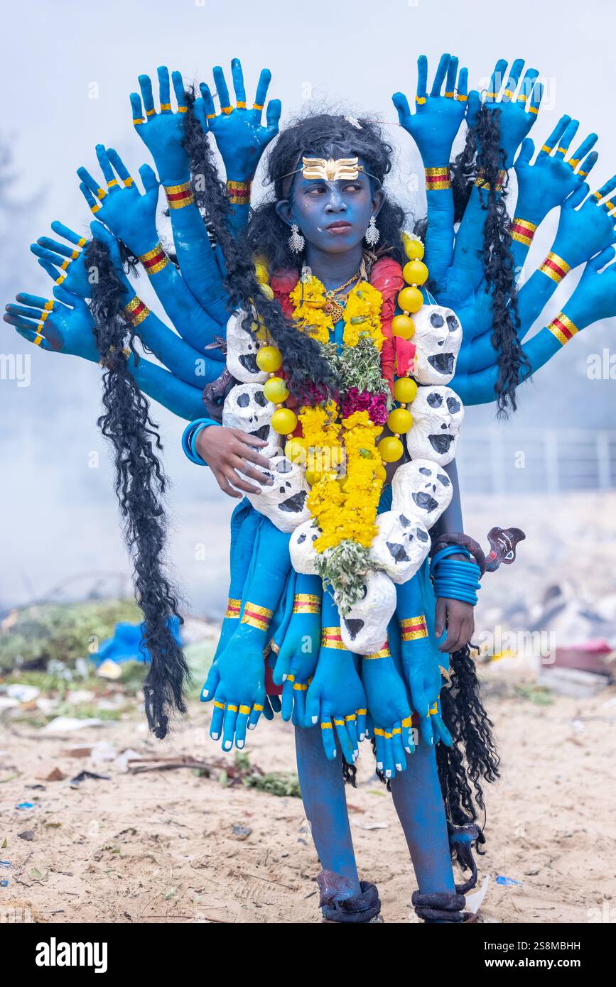 Kulasai, Portrait of indian hindu devotee with painted face and dressed ...
