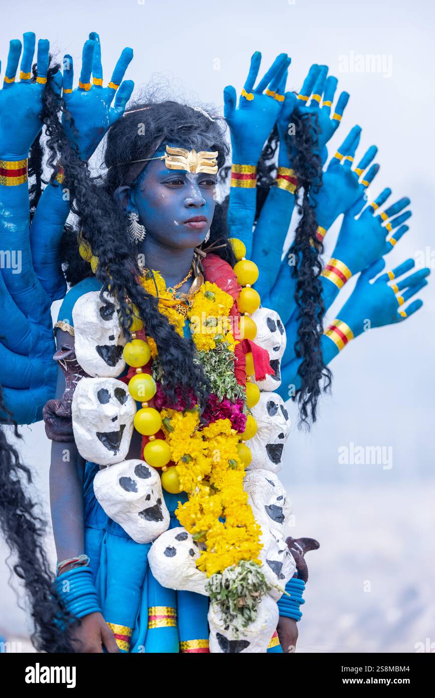 Kulasai, Portrait of indian hindu devotee with painted face and dressed ...