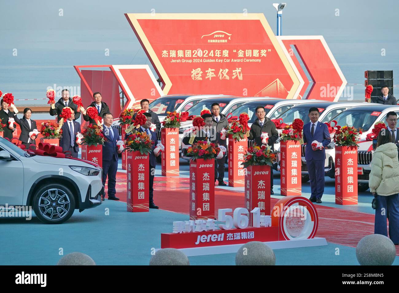 YANTAI, CHINA - JANUARY 23, 2025 - Award-winning employees pose for a ...