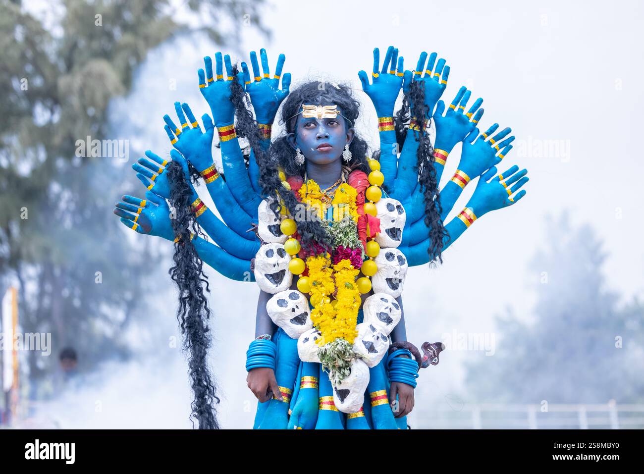 Kulasai, Portrait of indian hindu devotee with painted face and dressed ...