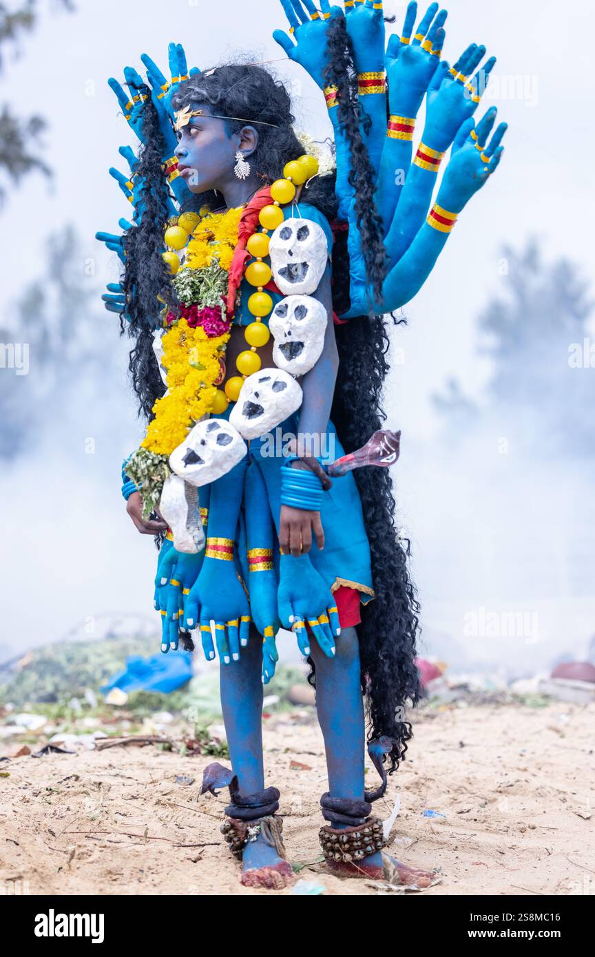 Kulasai, Portrait of indian hindu devotee with painted face and dressed ...