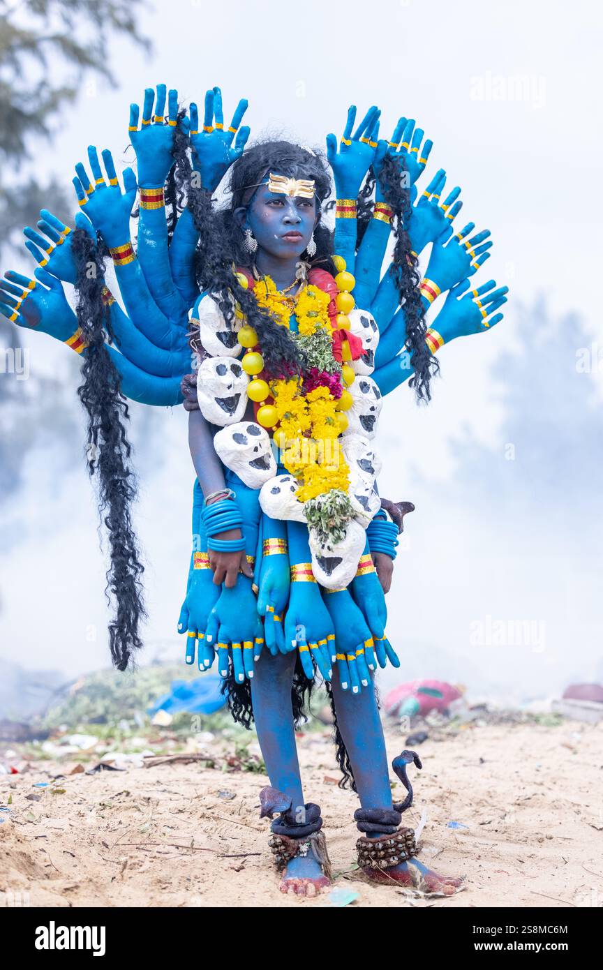 Kulasai, Portrait of indian hindu devotee with painted face and dressed ...