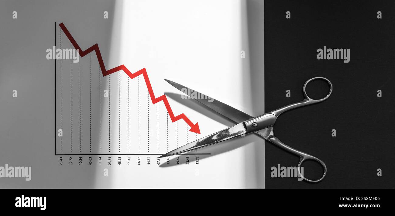 Financial chart showing negative trend and scissors: financial crisis ...