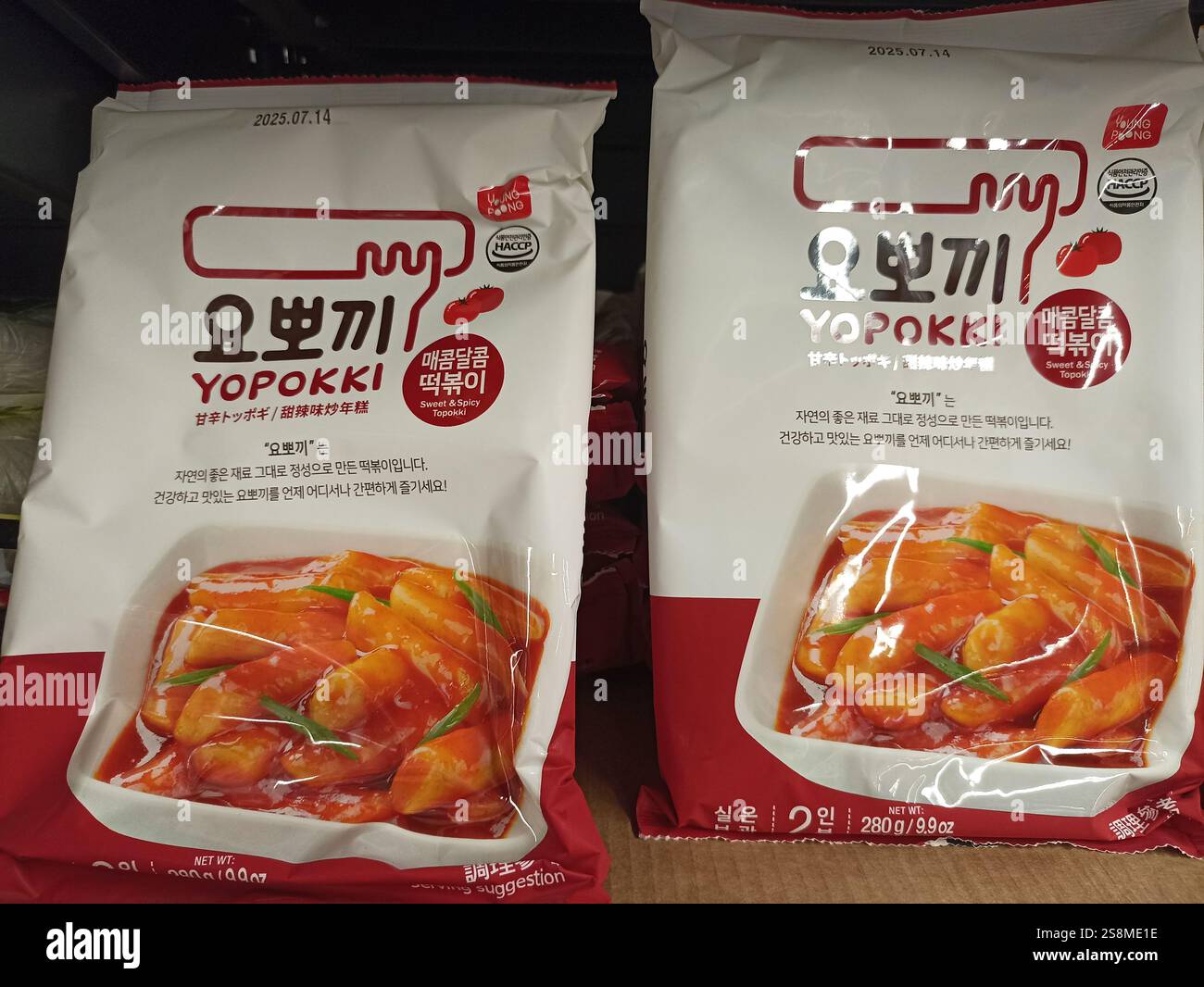 Spicy korean tteokbokki snack packaging on display Stock Photo - Alamy