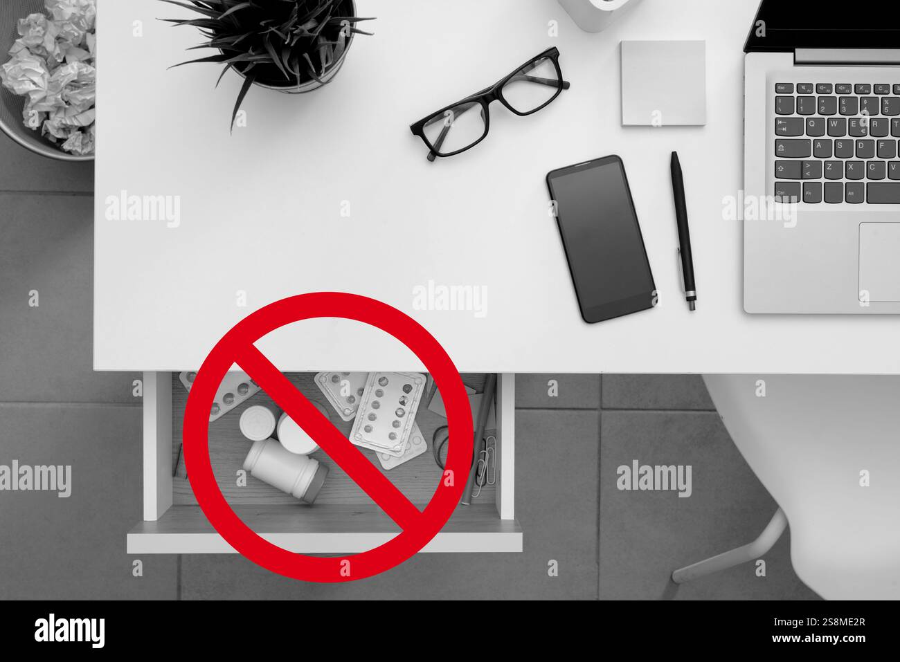 Many medicines hidden in the work desk drawer and prohibition sign ...