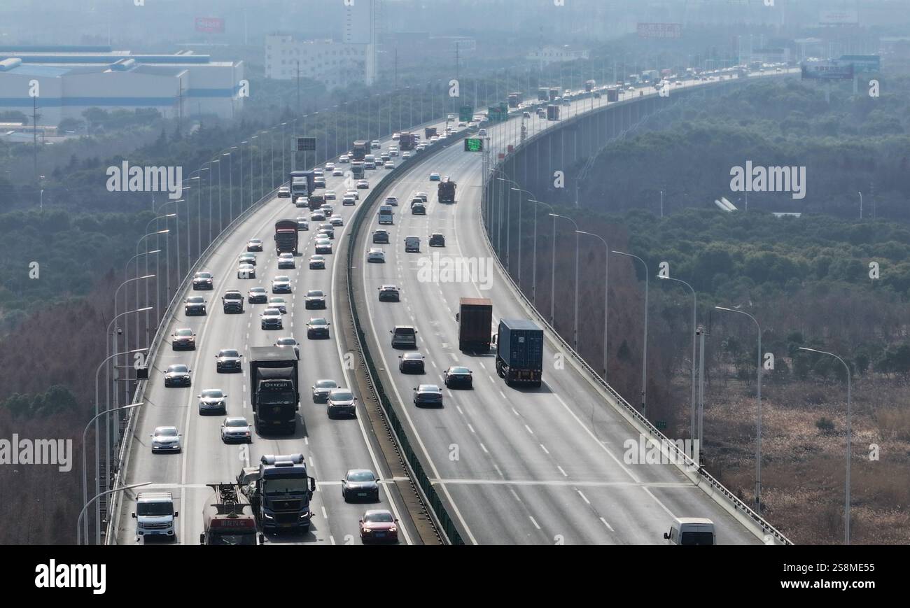 Traffic flows past the Sutong Bridge in Changshu city, East China's ...