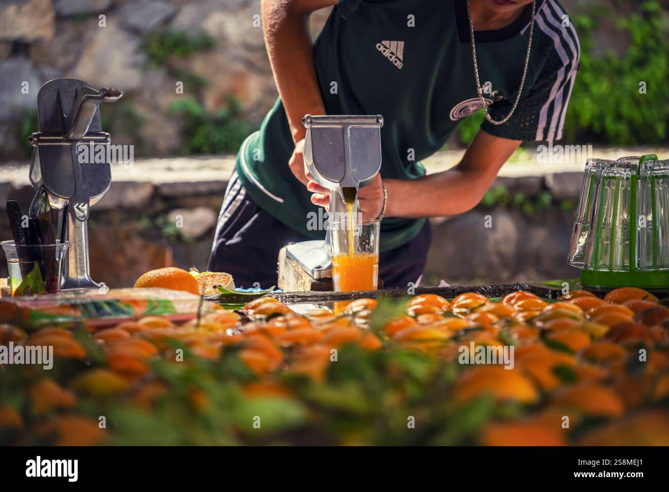 Chefchaouen, Morocco. Vintage orange squeezer used to prepare a fresh ...