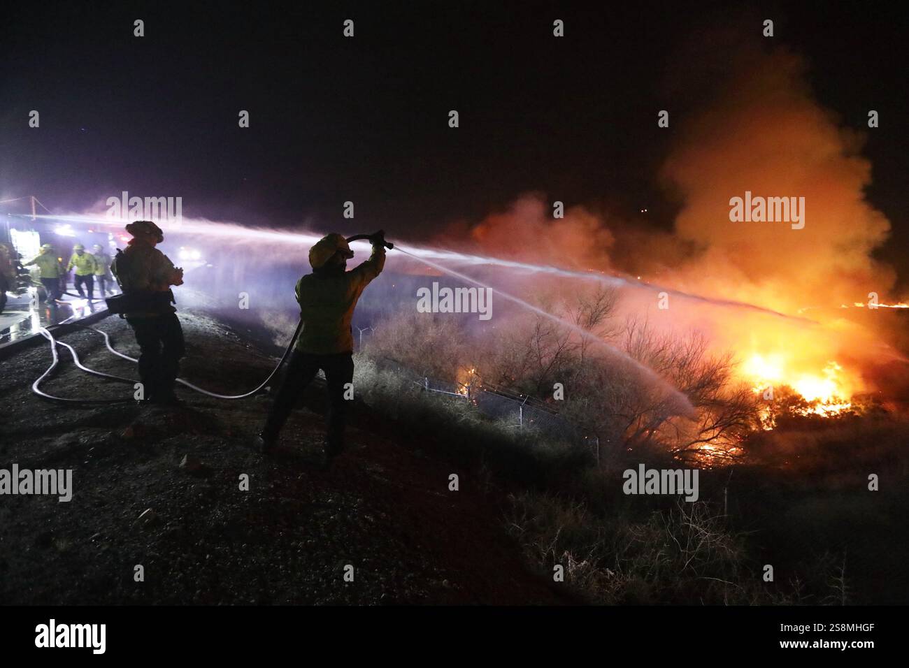 Los Angeles, USA. 22nd Jan, 2025. Firefighters battle the raging ...