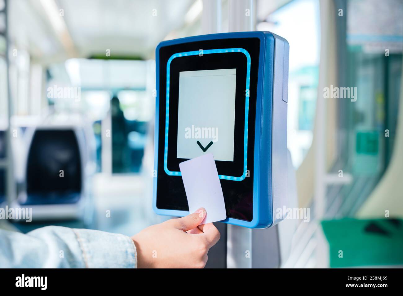 Hand Validating Ticket on Electronic Scanner Inside Public Transport ...
