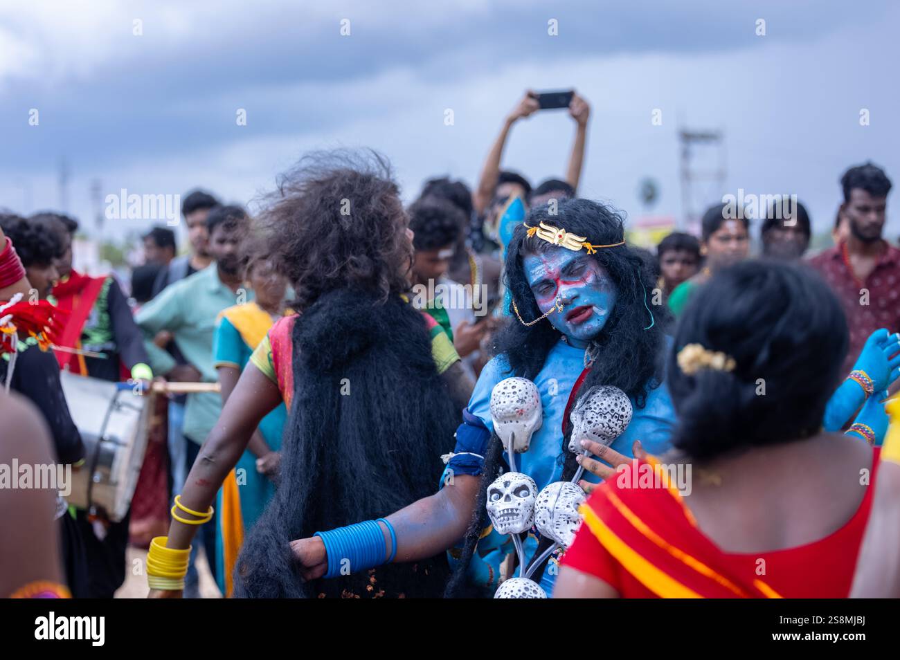 Kulasai, Portrait of indian hindu devotee with painted face and dressed ...