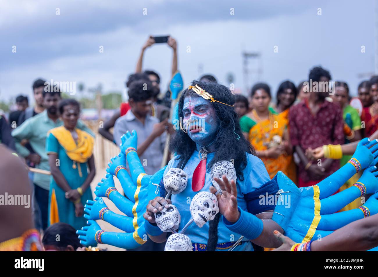 Kulasai, Portrait of indian hindu devotee with painted face and dressed ...