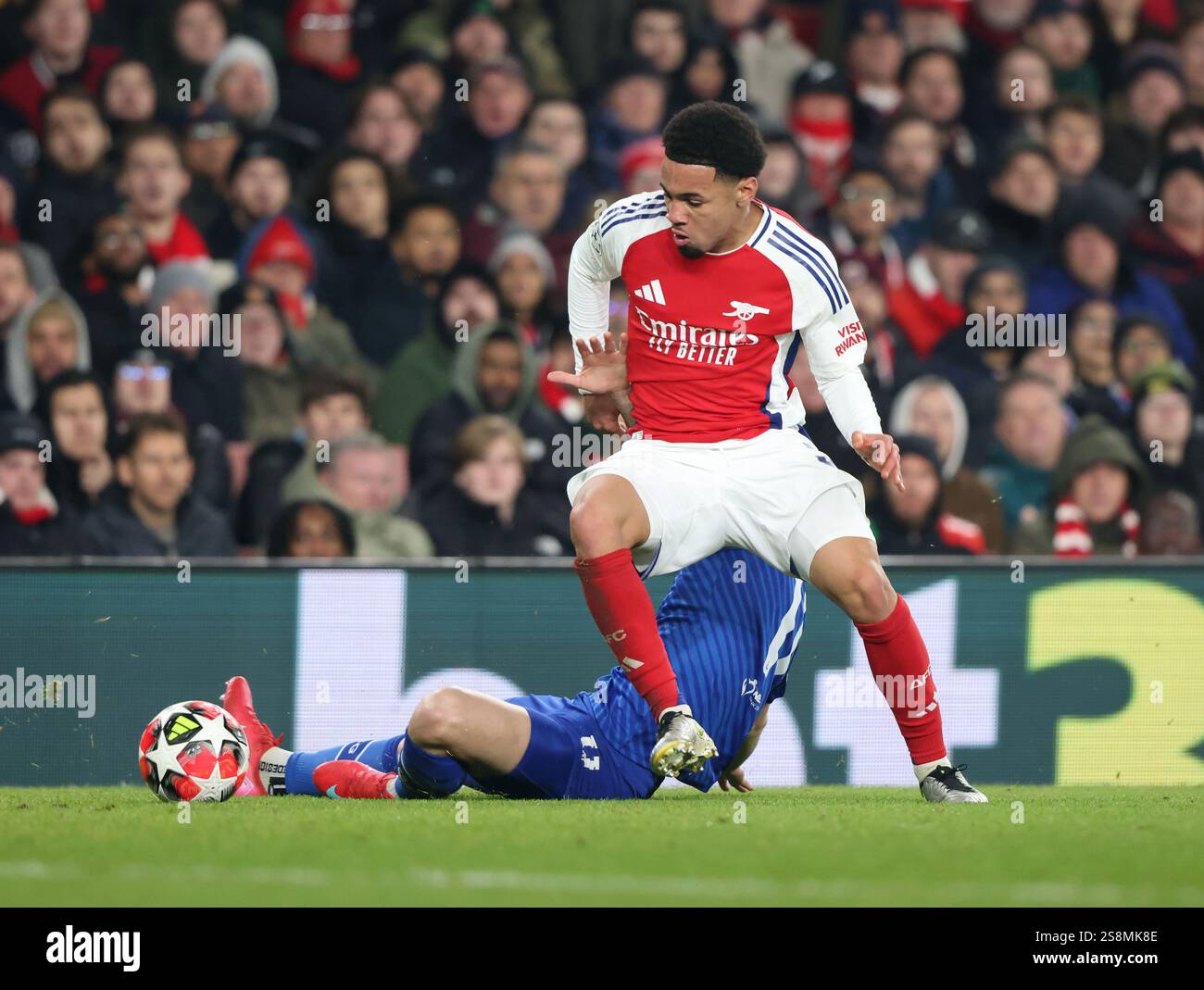 London, UK. 22nd Jan, 2025. Ethan Nwaneri (A) Arber Hoxha of Dinamo ...