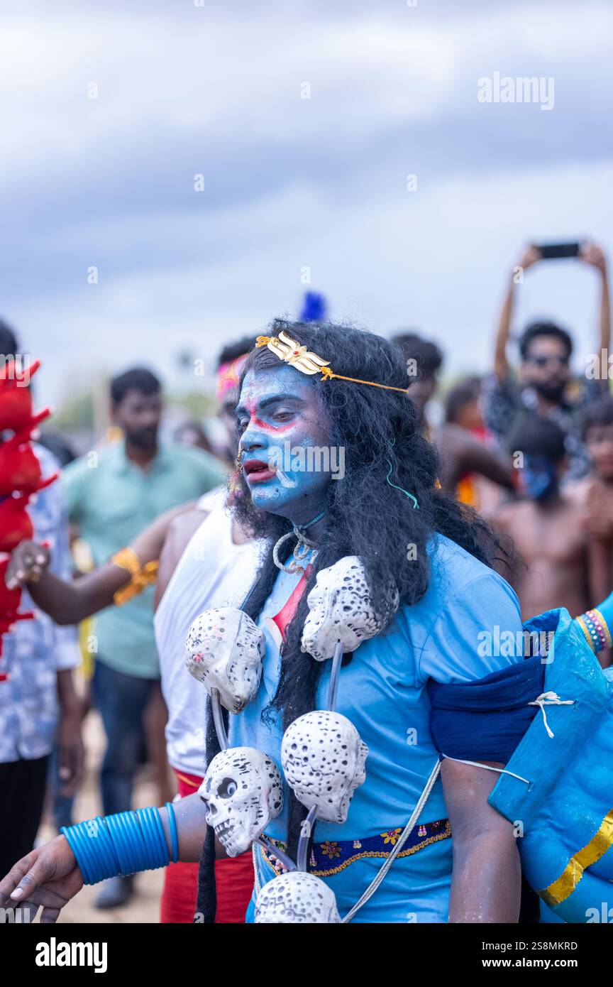 Kulasai, Portrait of indian hindu devotee with painted face and dressed ...