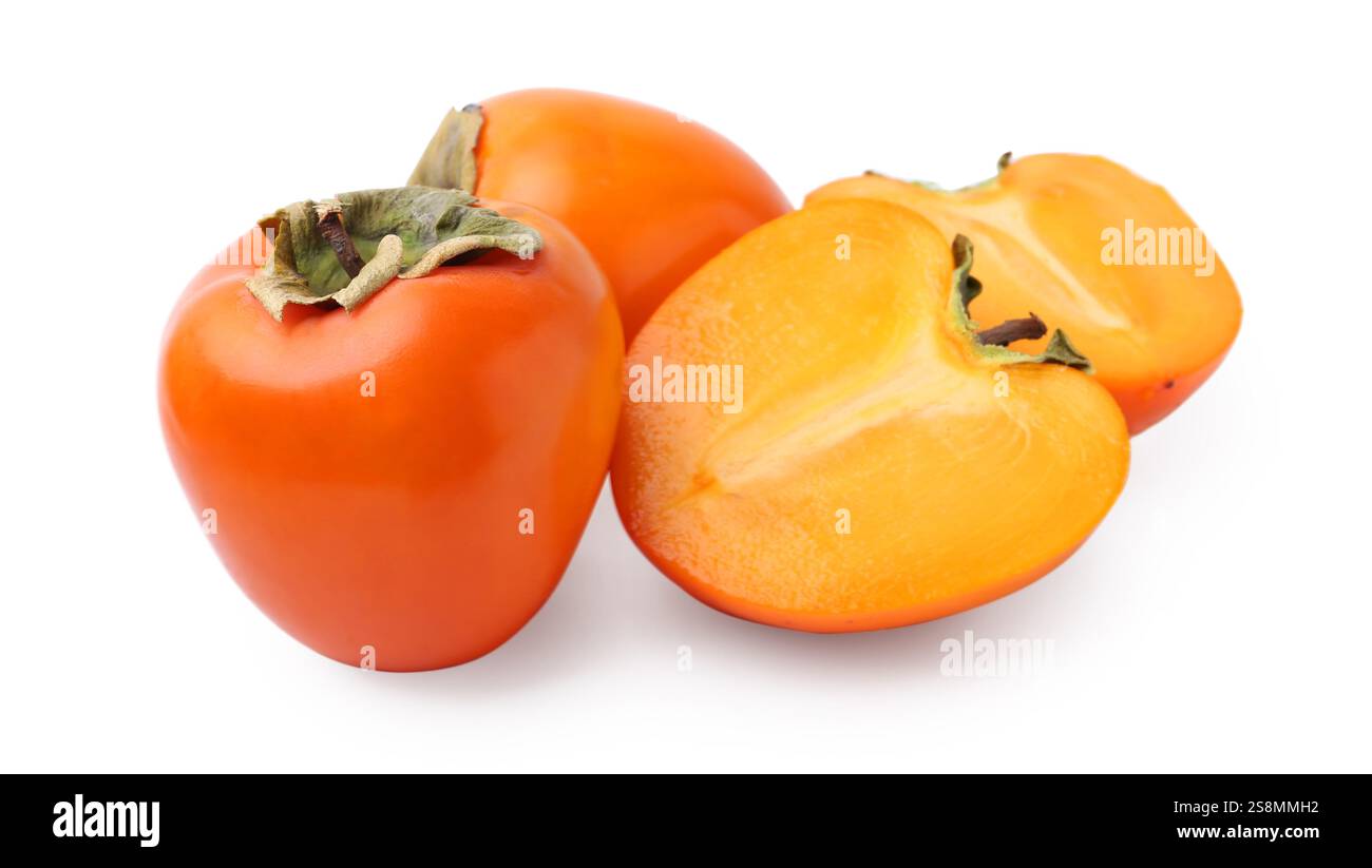 Whole and cut fresh persimmons isolated on white Stock Photo - Alamy