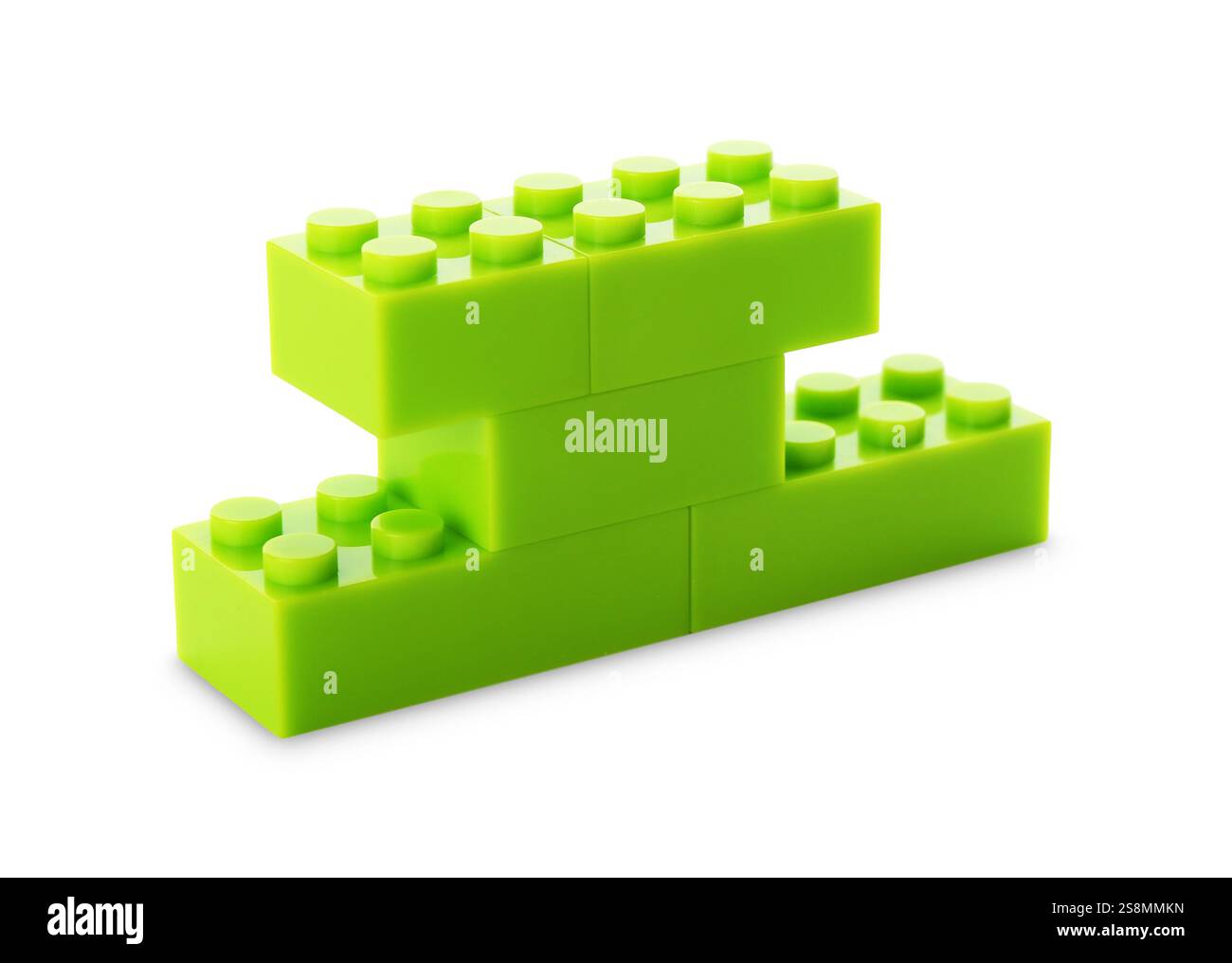 Construction toy. Figure made with building bricks isolated on white ...
