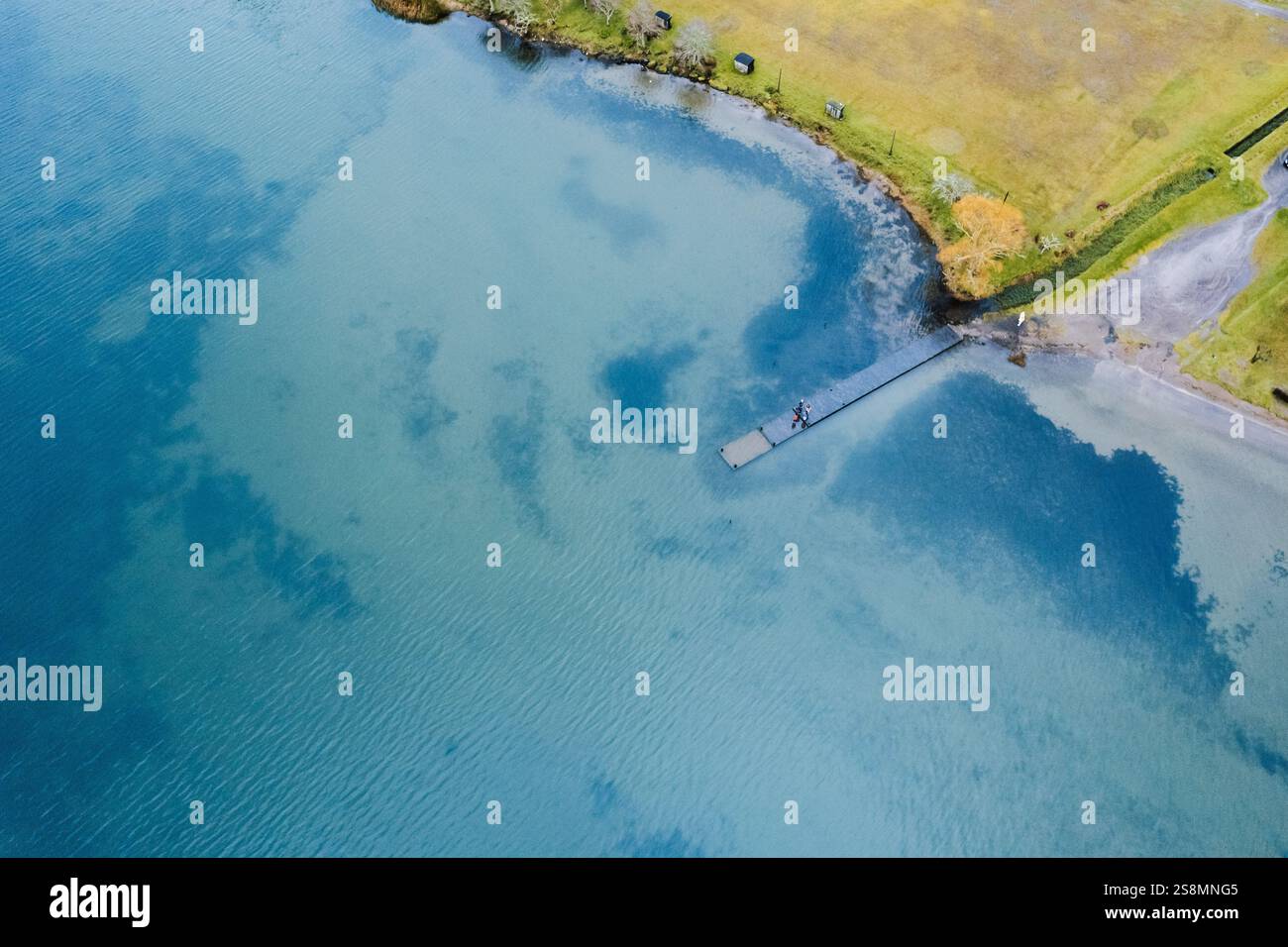 aerial view of a jetty on the shore of the lake of Sete Cidades, sao ...