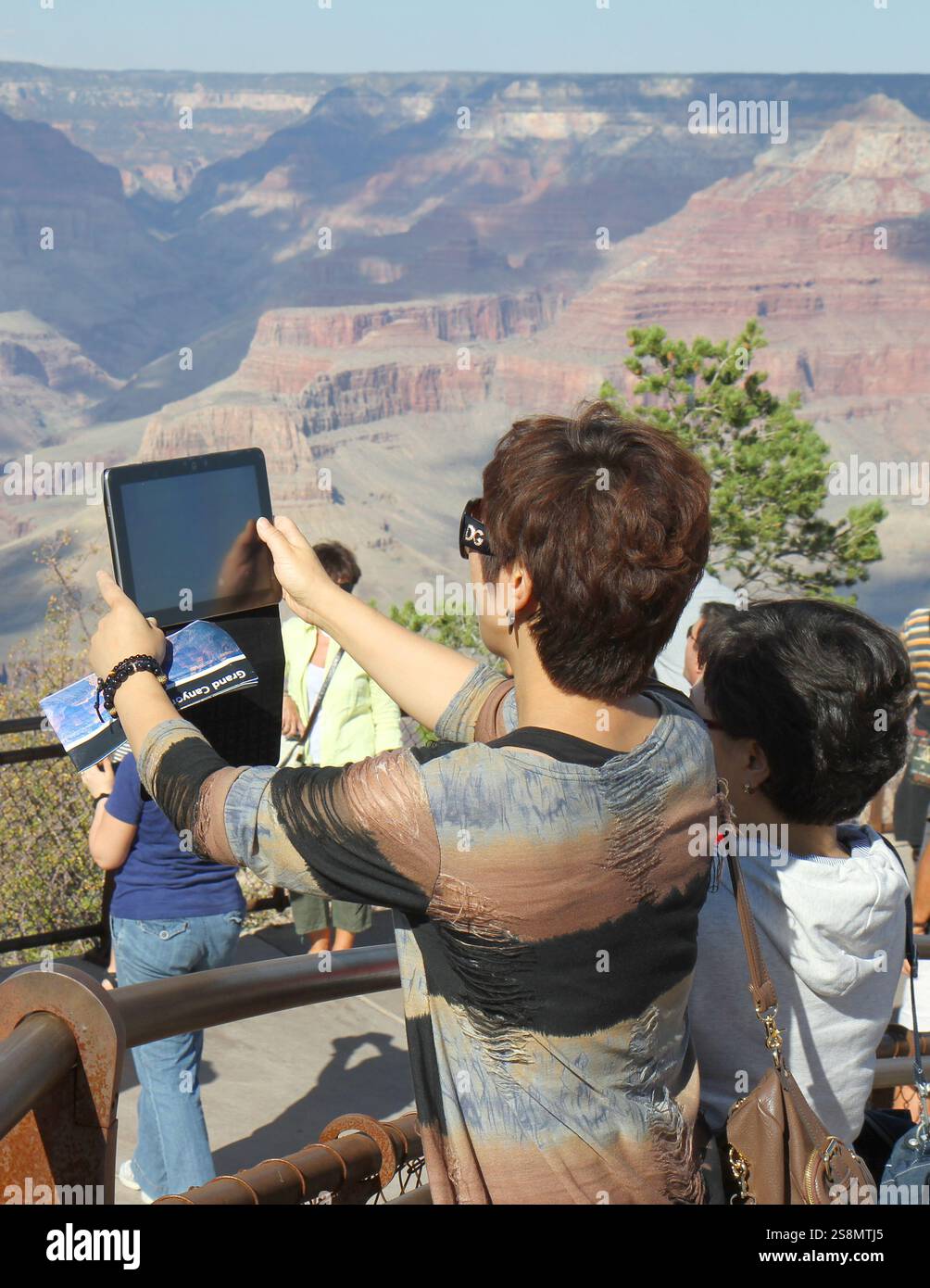 GRAND CANYON, ARIZONA, USA-SEPTEMBER 29,2012:Unidentified Asian Tourist ...