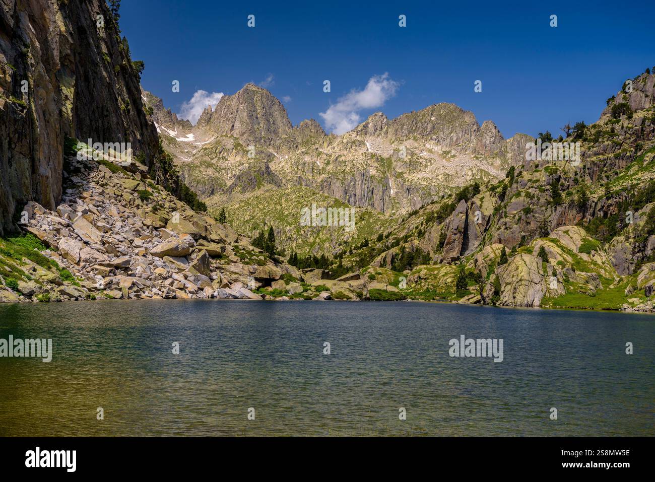 Tumeneia mountain range seen from the Estany Gran de Colieto, on the ...