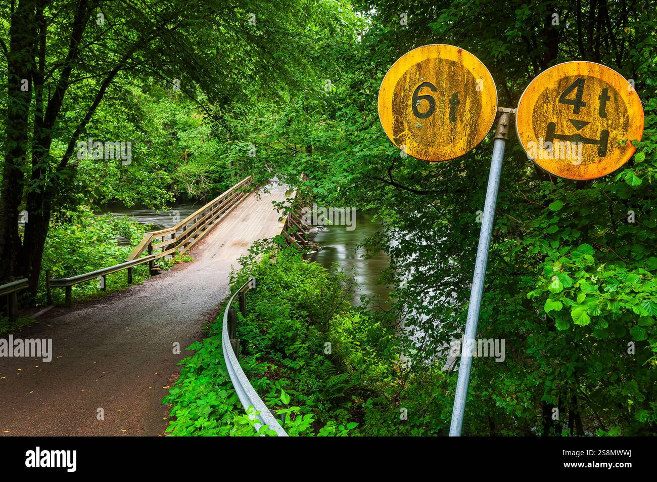 A bridge is seen in Sweden with important road signs indicating weight ...