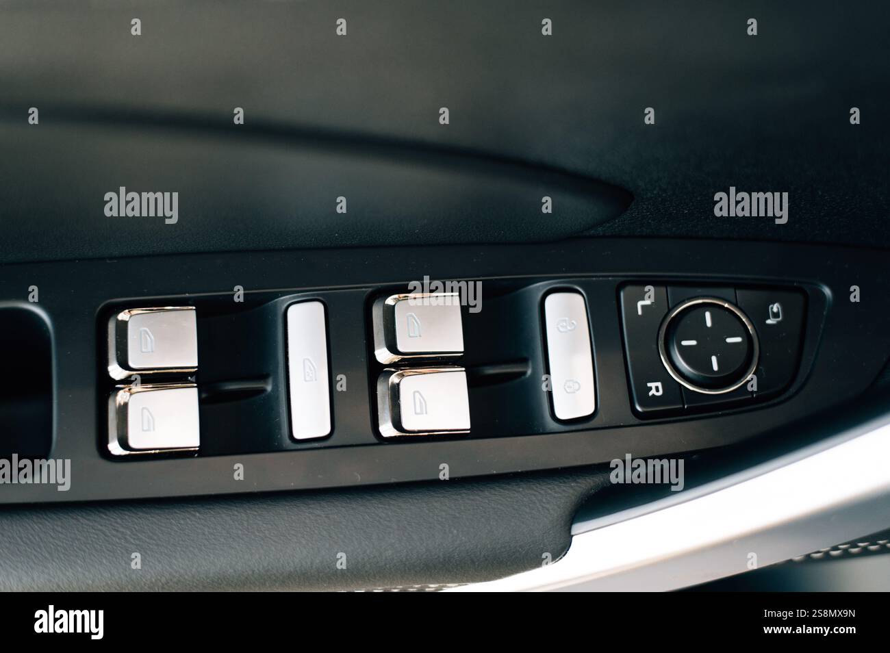 glass lift buttons in a new car Stock Photo - Alamy