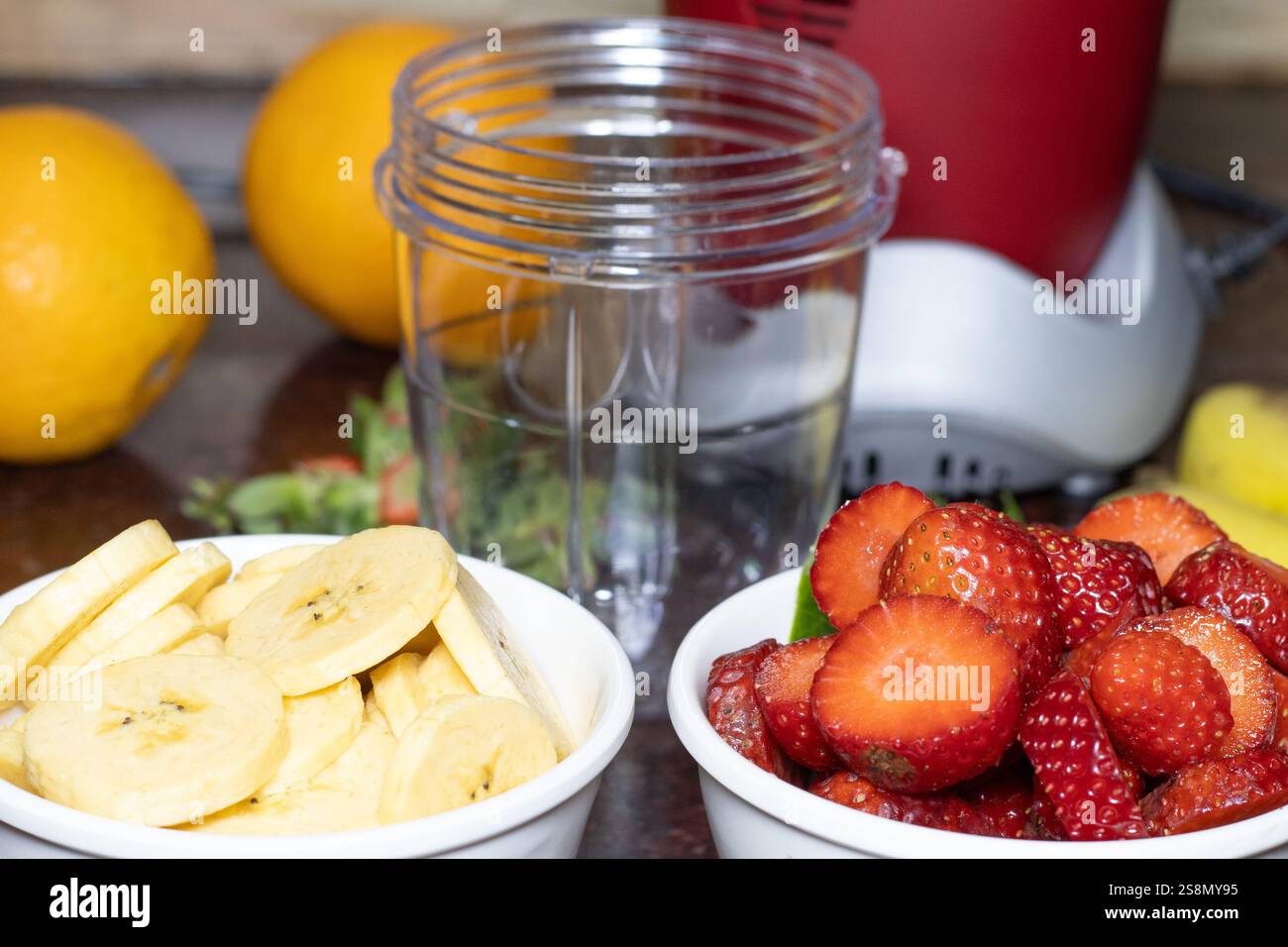 Sliced strawberry and plaintain banana kept ready to prepare smoothie ...