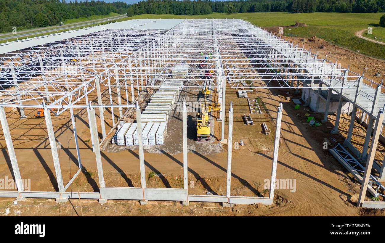 Aerial view of a large industrial construction site with steel ...