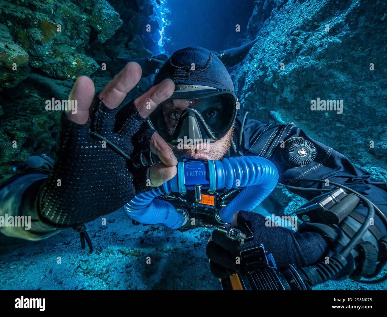 front of rebreather diver with ok sign in a canyon, cavern Stock Photo ...