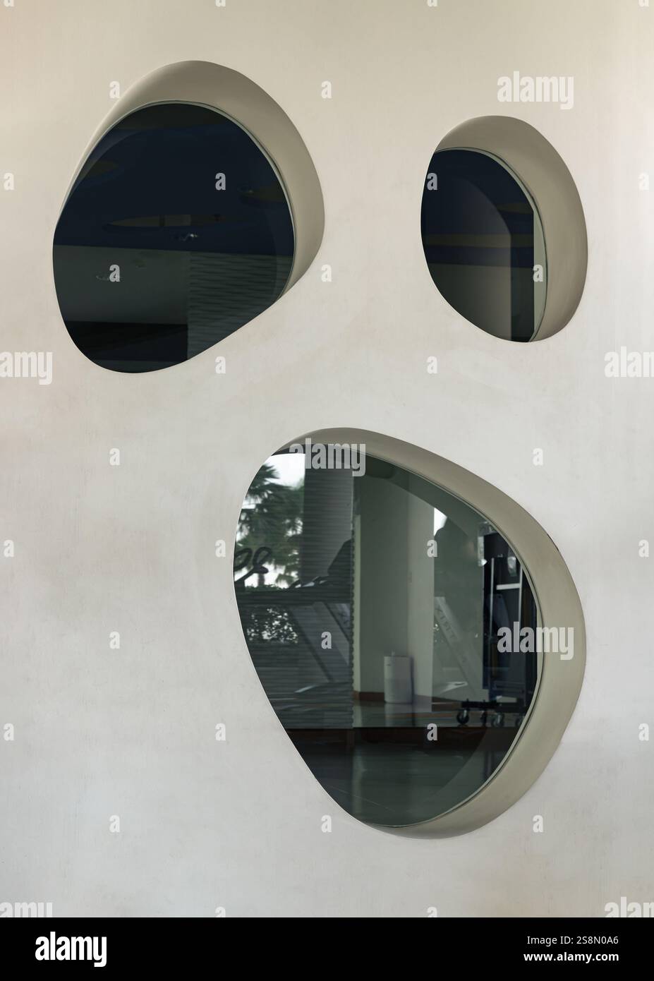Bangkok, Thailand - Jan 18, 2025 - Glass mirrored panels are embedded ...