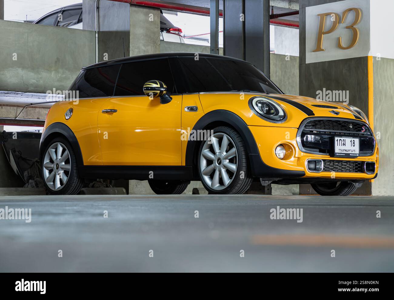 Bangkok, Thailand - 18 Jan 2025 - View of Yellow mini cooper parked ...